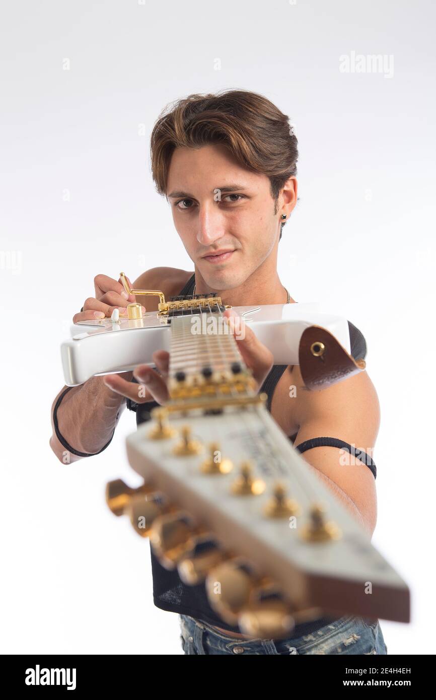 Studio portrait of a muscular built italian young man Stock Photo - Alamy