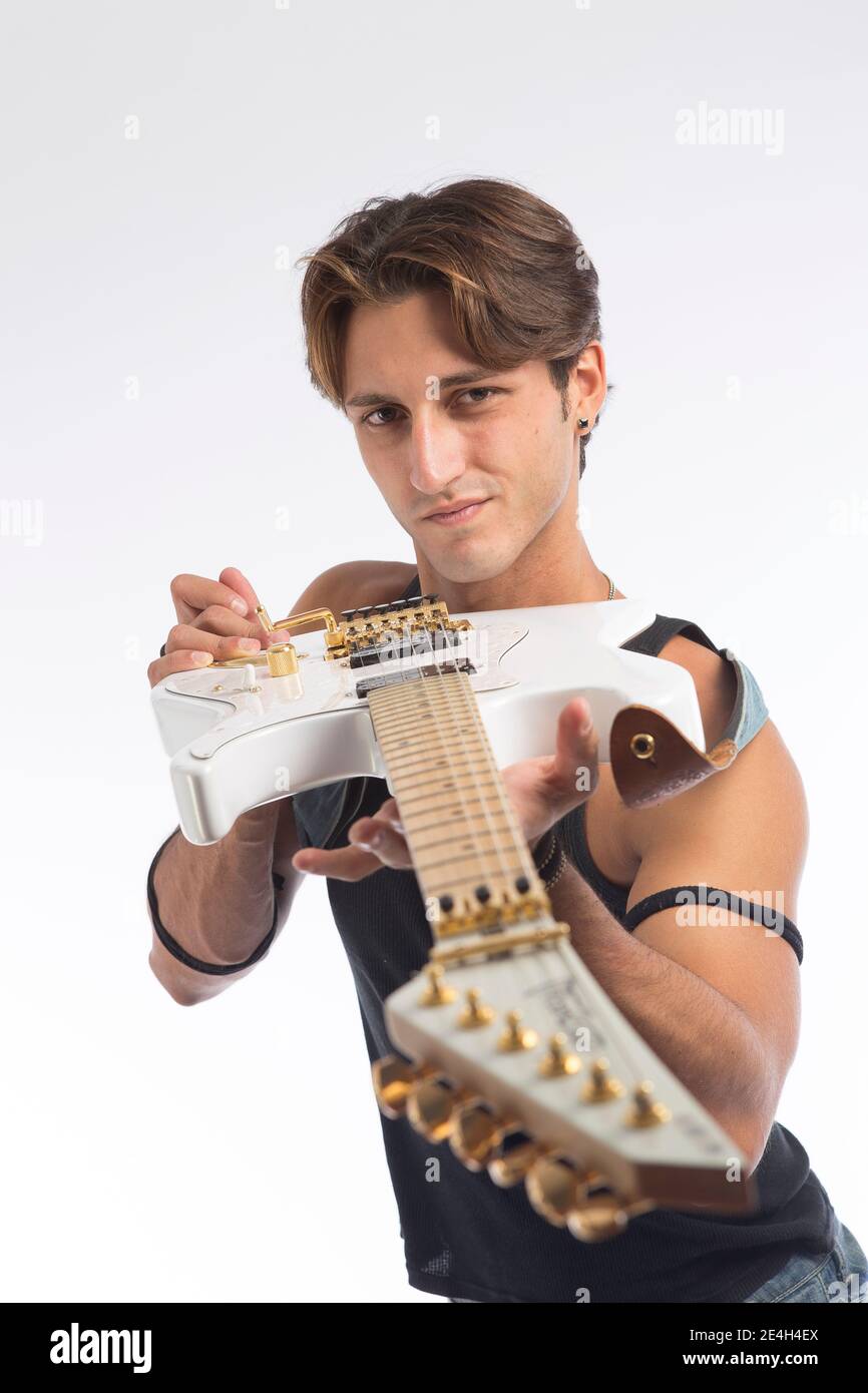 Studio portrait of a muscular built italian young man Stock Photo - Alamy