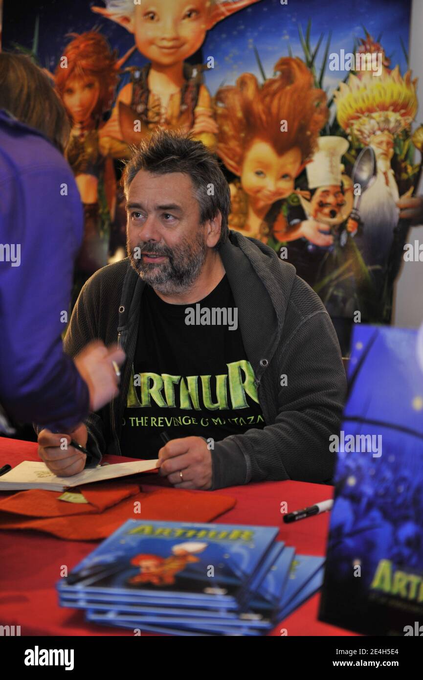 "French film director Luc Besson signs copies of his latest animated ...