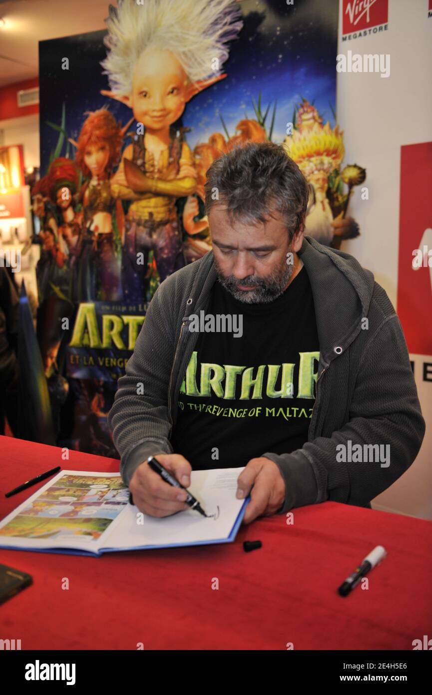 "French film director Luc Besson signs copies of his latest animated ...