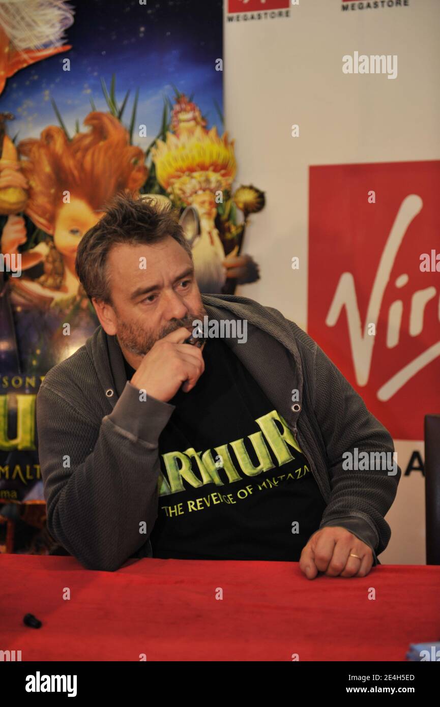 "French film director Luc Besson signs copies of his latest animated ...