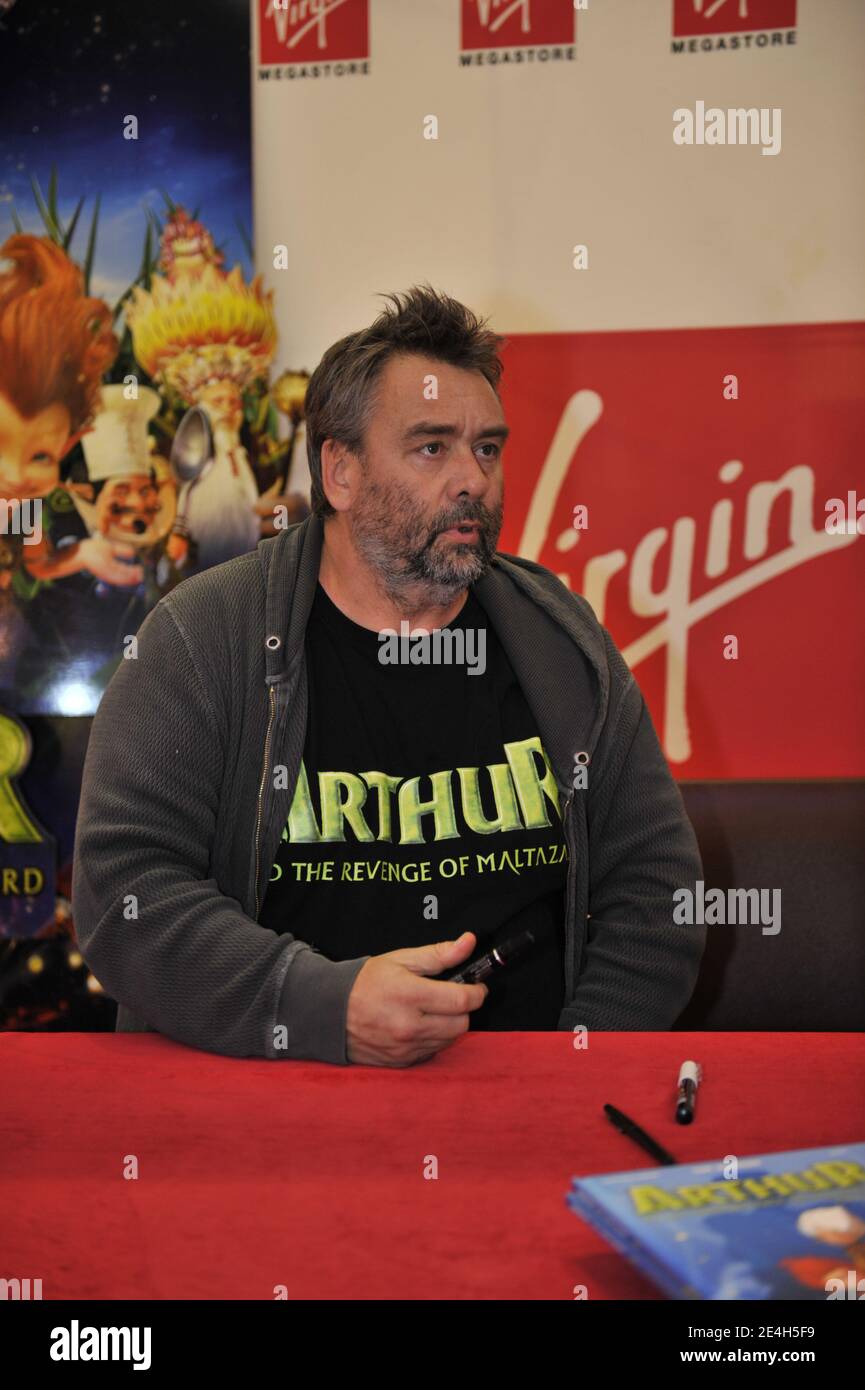 "French film director Luc Besson signs copies of his latest animated ...