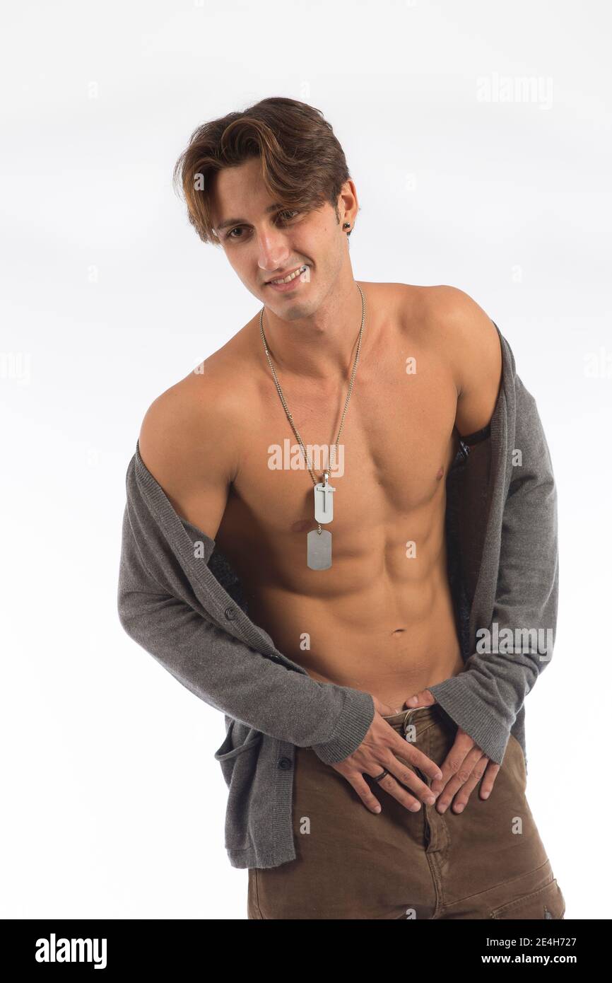 Studio portrait of a muscular built italian young man Stock Photo - Alamy
