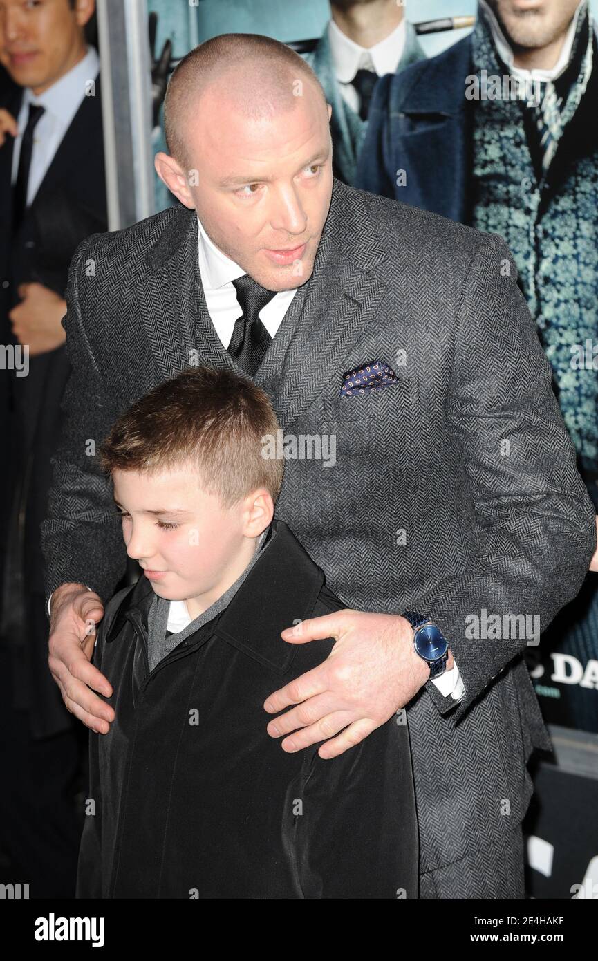 Director Guy Ritchie and son Rocco arriving for the premiere of ...