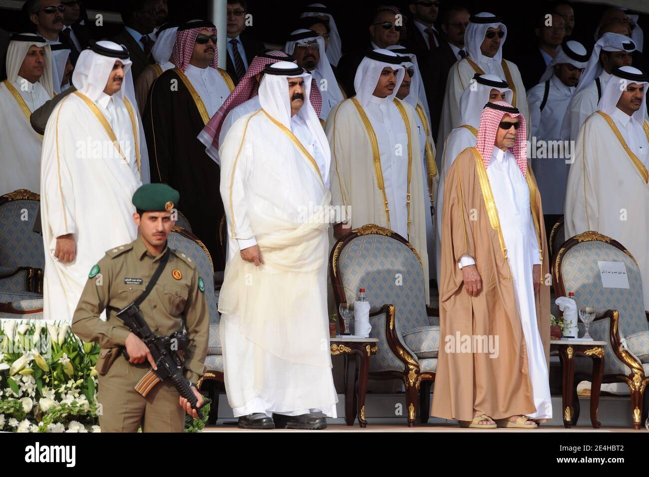 Qatar's Emir Sheikh Hamad Bin Khalifa Al Thani (C) and his son Crown ...