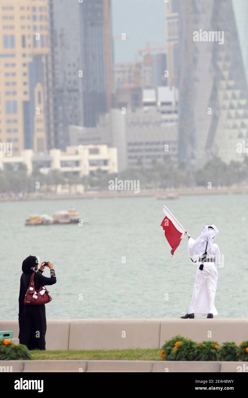 Qatari people seen on the Doha's corniche as they celebrate Qatar's ...