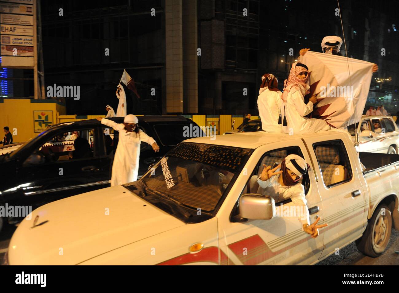 Qatari people decorate their 4-wheel-drive cars with hearts, flags ...