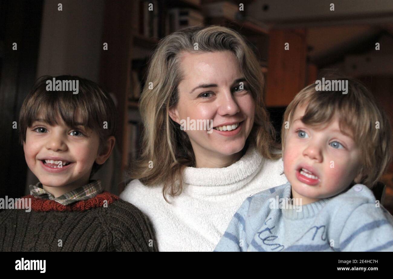 French citizen Nathalie Gettliffe poses with her sons Martin and Jean ...