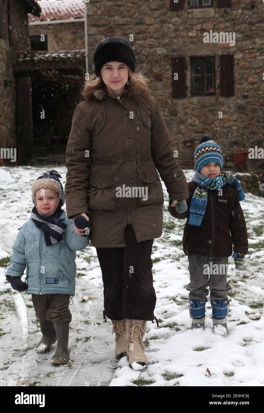 French citizen Nathalie Gettliffe poses with her sons Martin and Jean ...