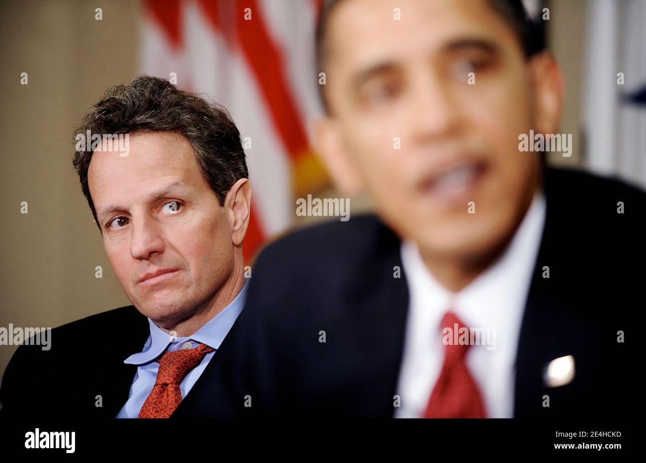 Looks on as us treasury secretary tim geithner hi-res stock photography ...