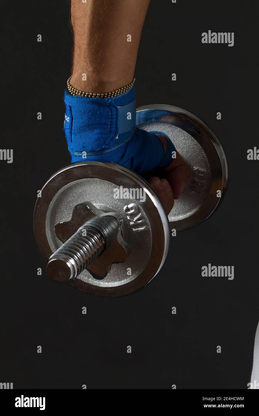 Studio portrait of a muscular built italian young man Stock Photo - Alamy