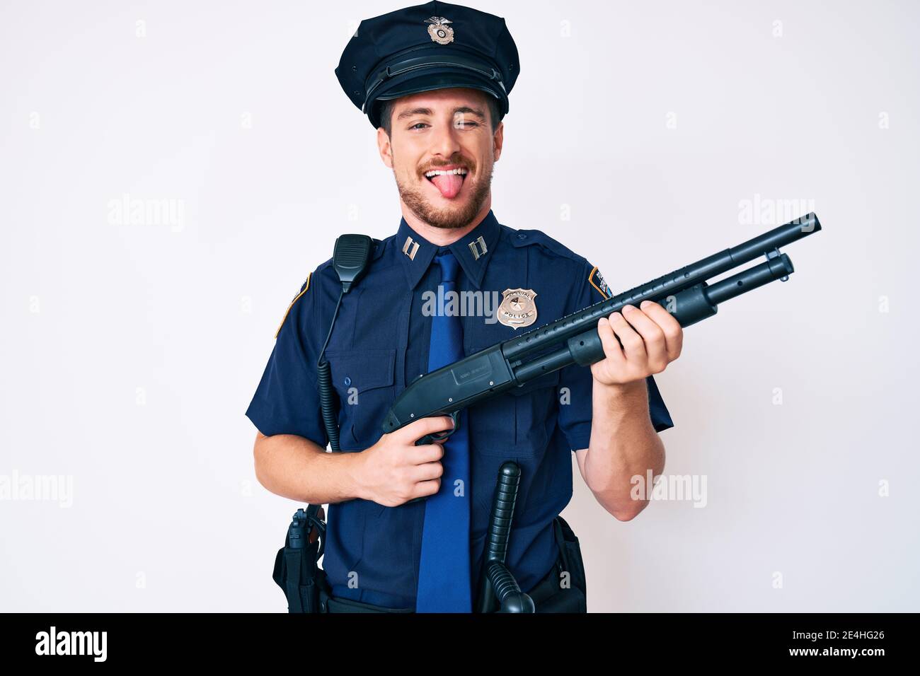 Policeman holding stick hi-res stock photography and images - Alamy