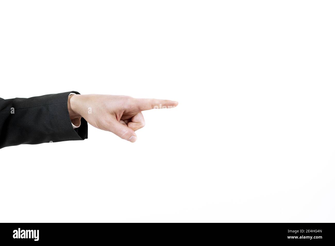 Male hand pointing to the right of the photo with his index finger ...