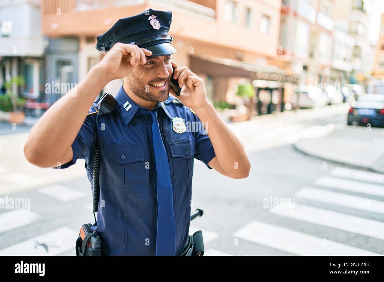 Authority communication smiling standing uniform hi-res stock ...