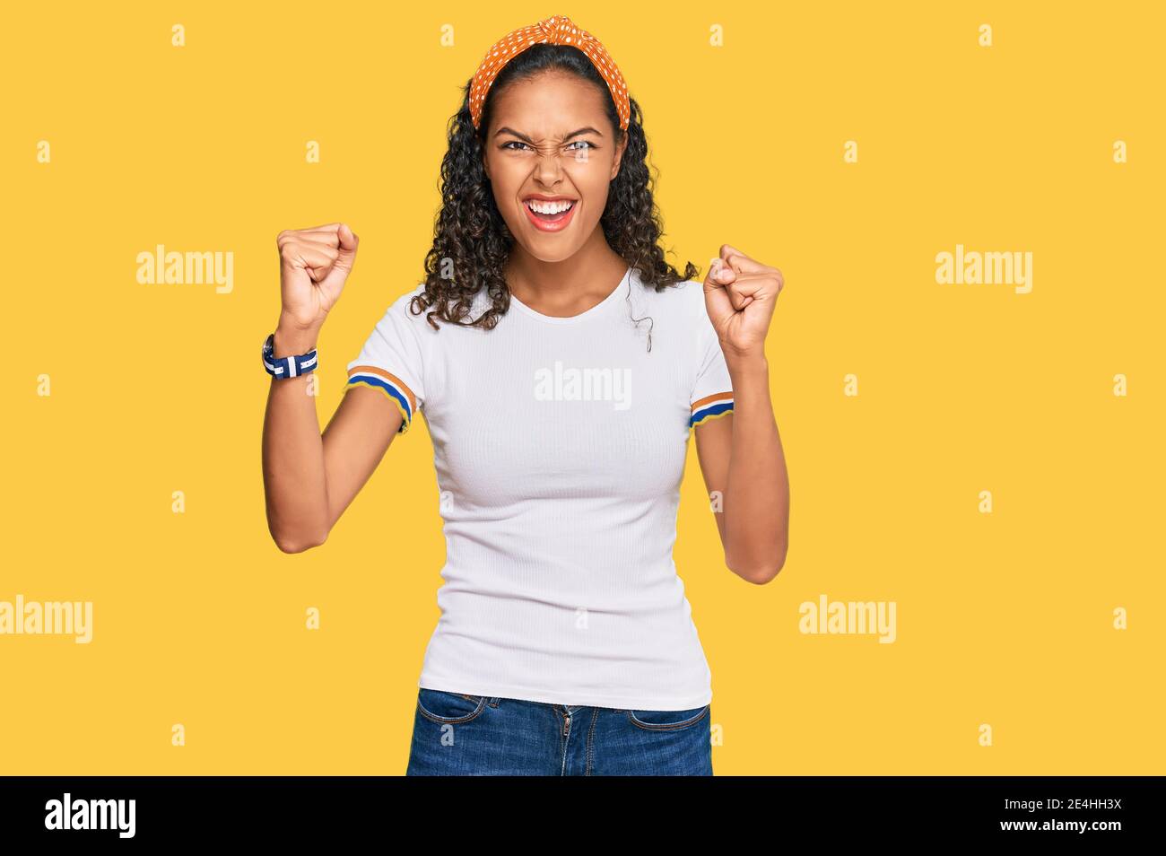 Young african american girl wearing casual clothes angry and mad ...