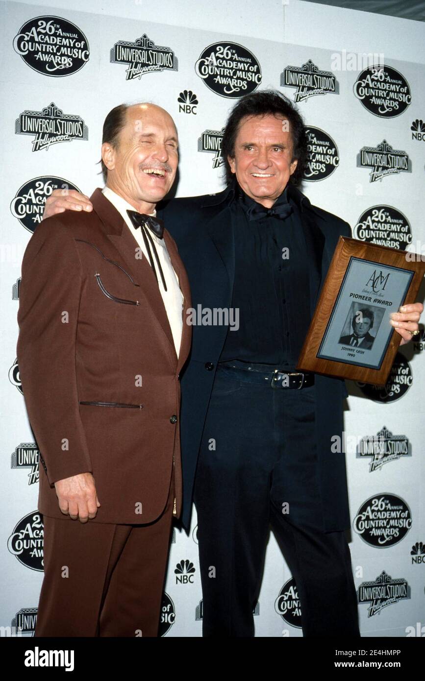 Robert Duvall And Johnny Cash at the 26th Annual Academy of Country ...