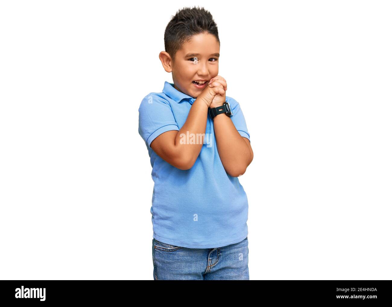 Little boy hispanic kid wearing casual clothes laughing nervous and ...