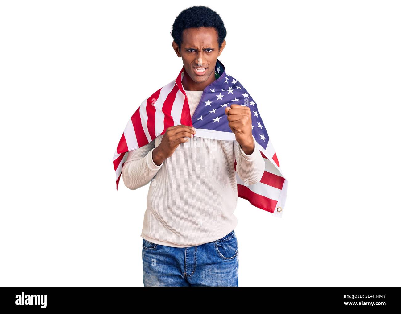 African handsome man holding united states flag annoyed and frustrated ...