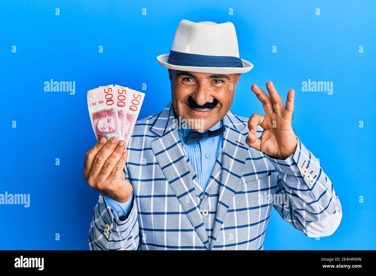 Mature middle east man with mustache wearing elegant vintage style ...