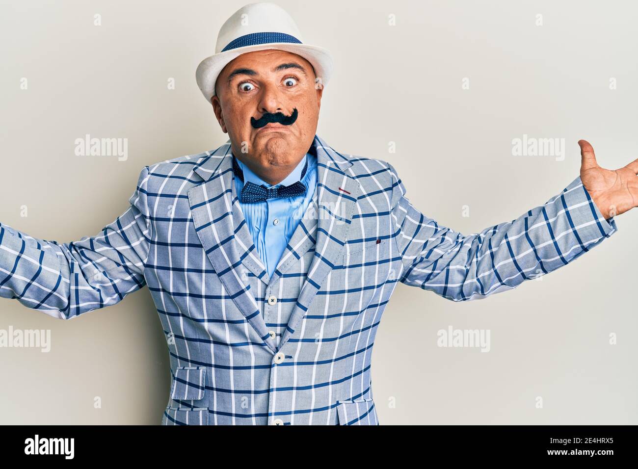 Mature middle east man with mustache wearing vintage and elegant ...