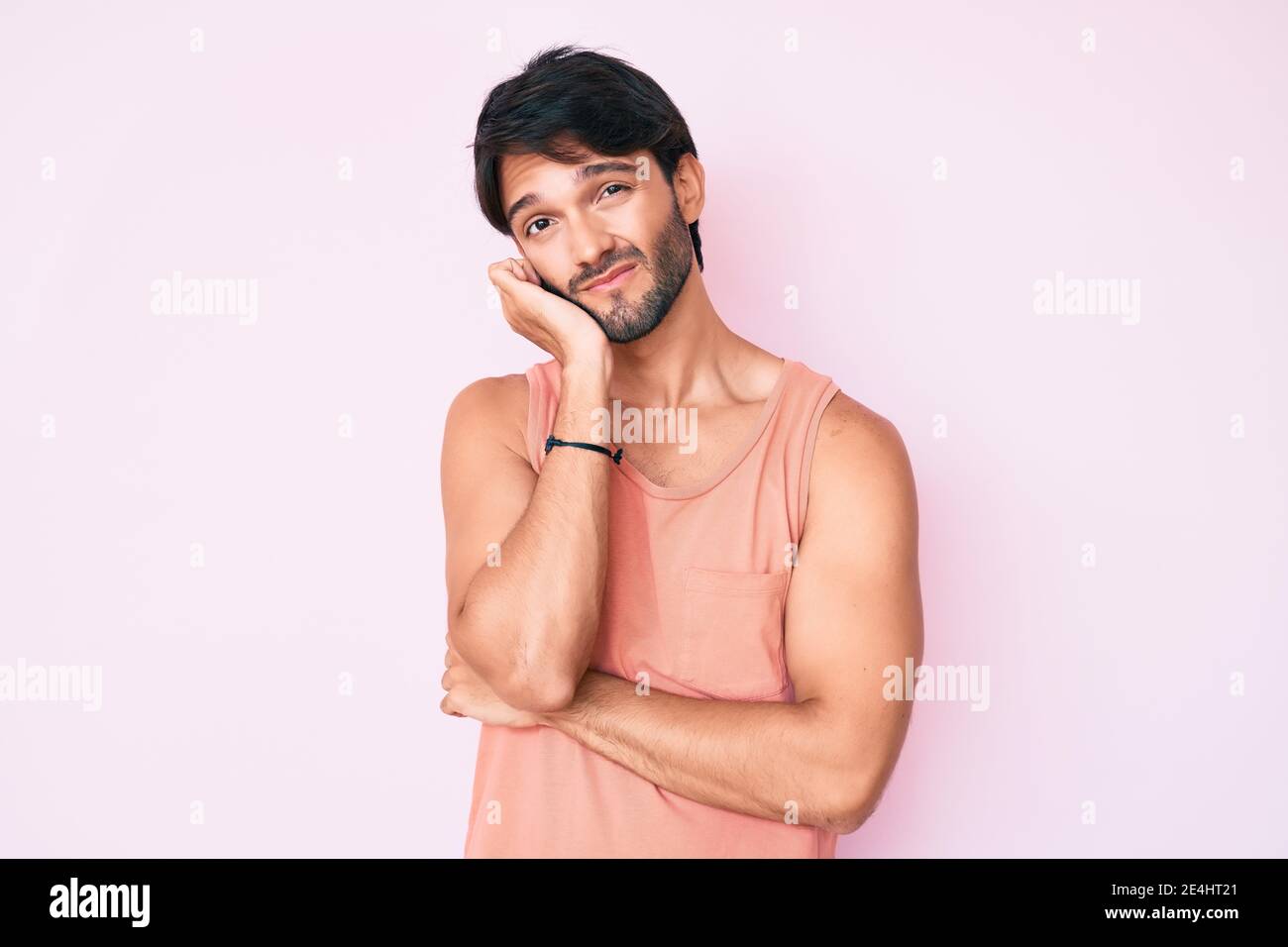 Handsome hispanic man wearing casual clothes thinking looking tired and ...