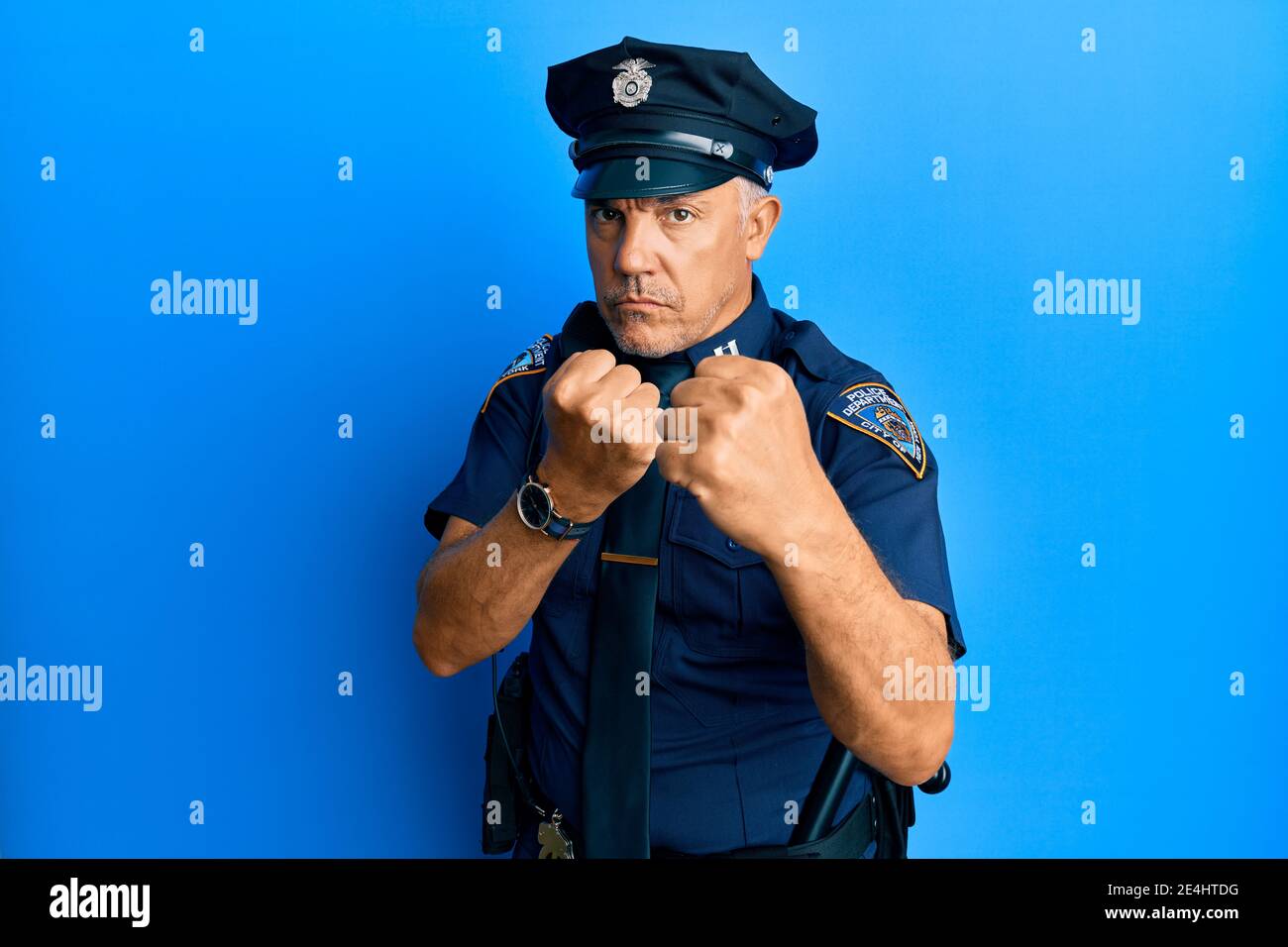 Policeman officer angry face cap hi-res stock photography and images ...