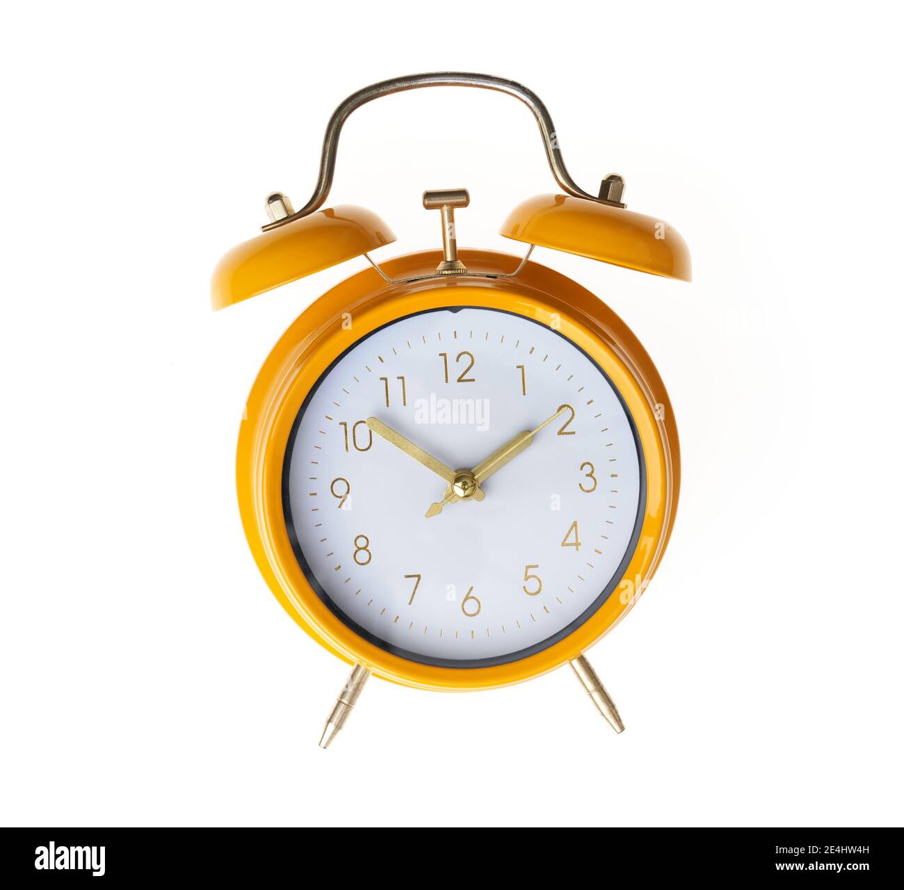 Hand of hispanic man holding yellow alarm clock over isolated white ...