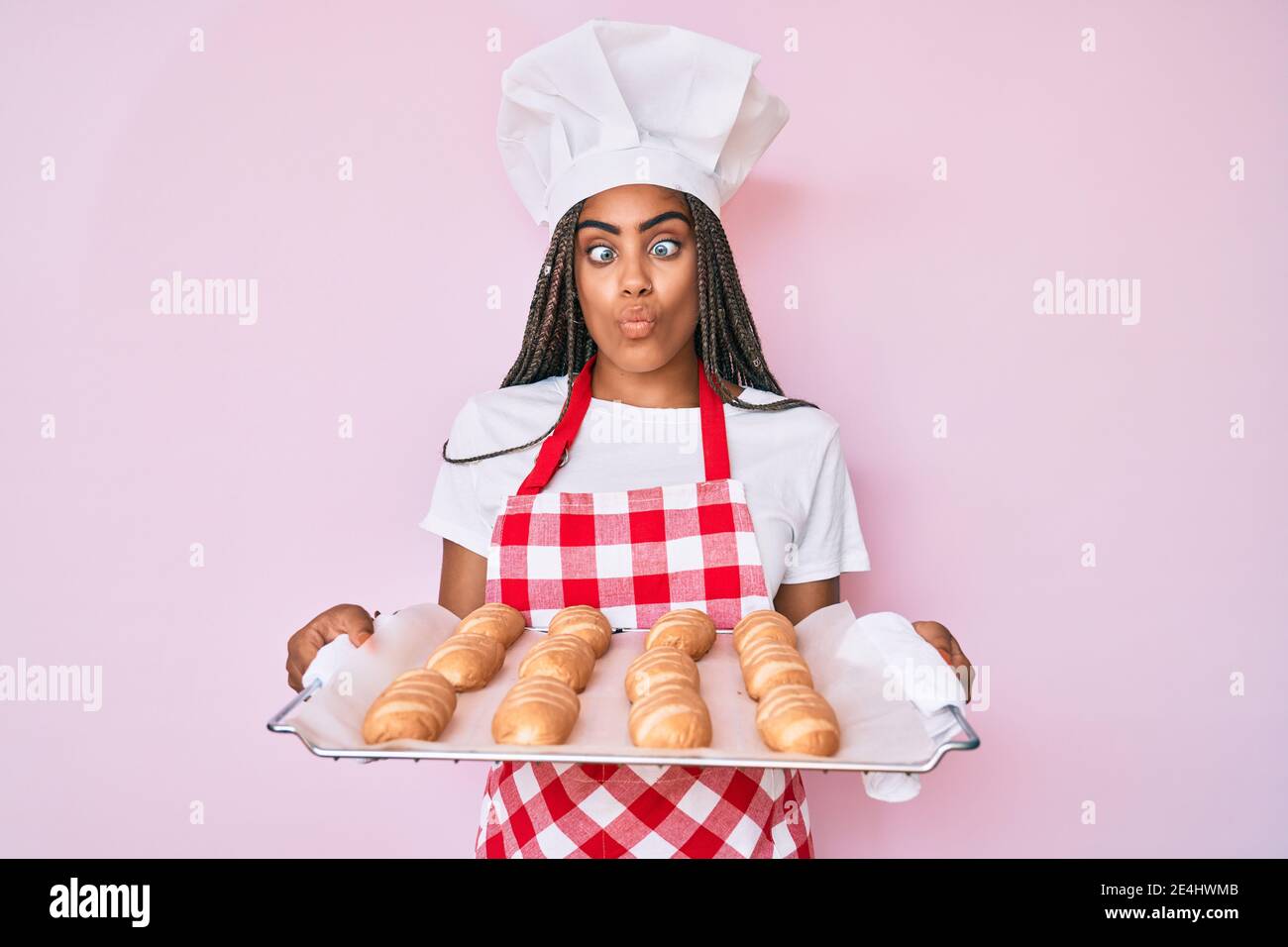 Laughing baker loaf bread hi-res stock photography and images - Alamy