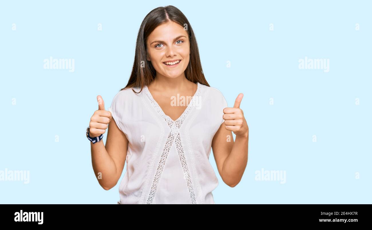 Young caucasian woman wearing casual clothes success sign doing ...