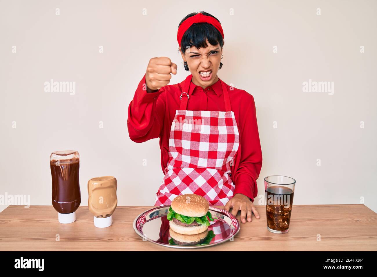 Shouting female cook uniform hi-res stock photography and images - Alamy