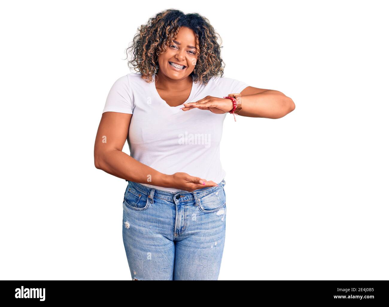 Young african american plus size woman wearing casual clothes gesturing ...
