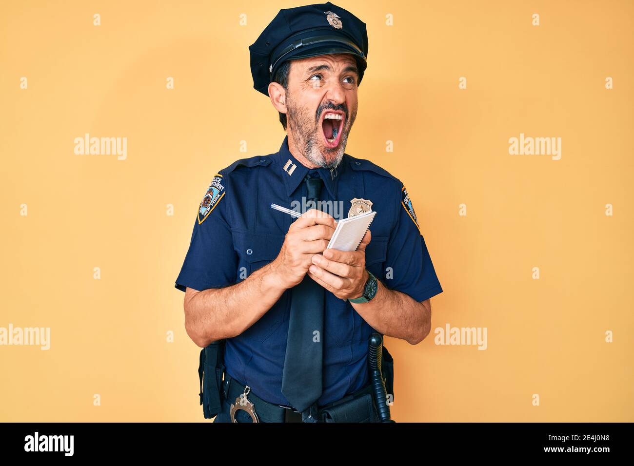 Hispanic police officer ticket hi-res stock photography and images - Alamy