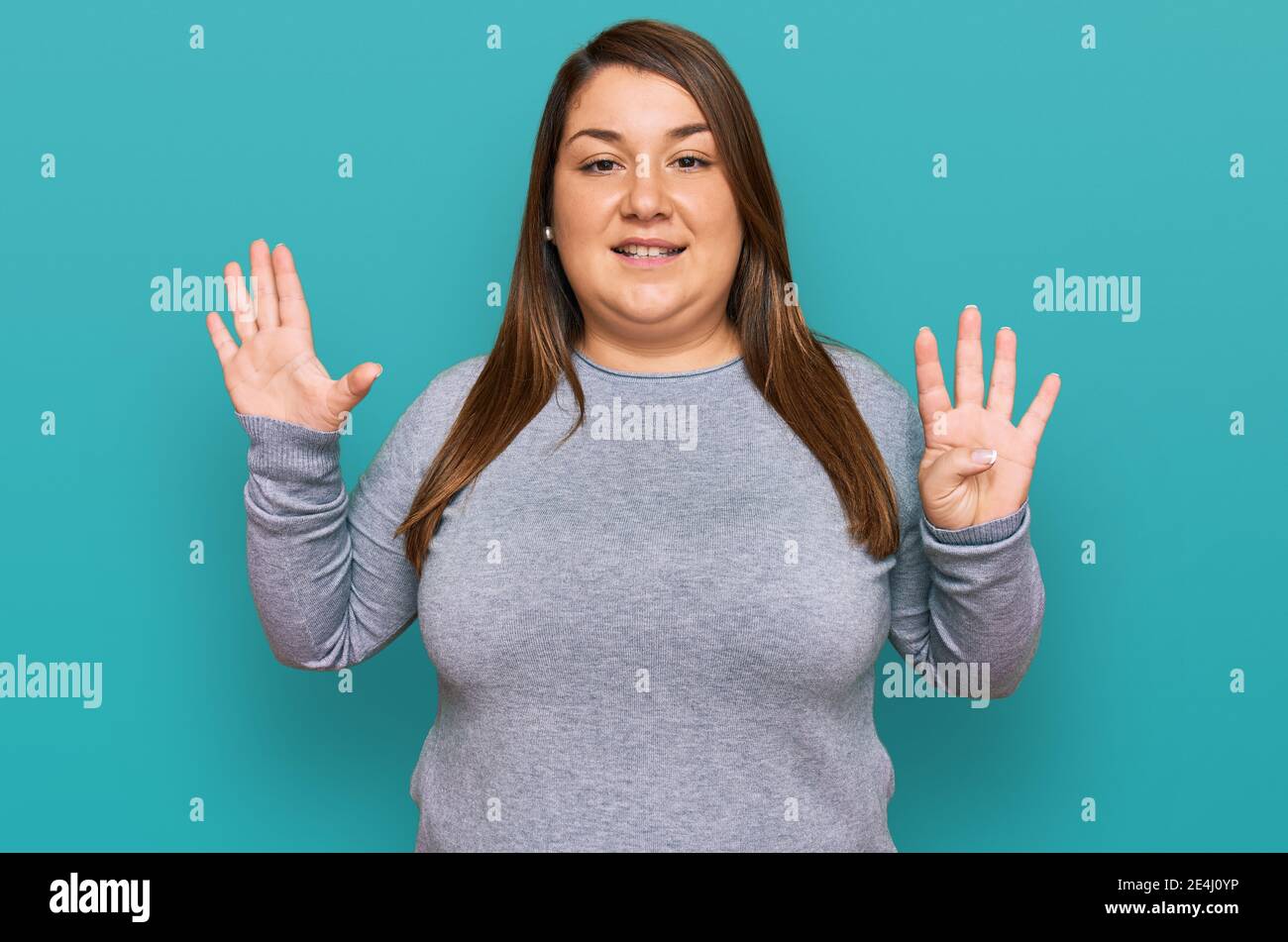 Beautiful Brunette Plus Size Woman Wearing Casual Clothes Showing And