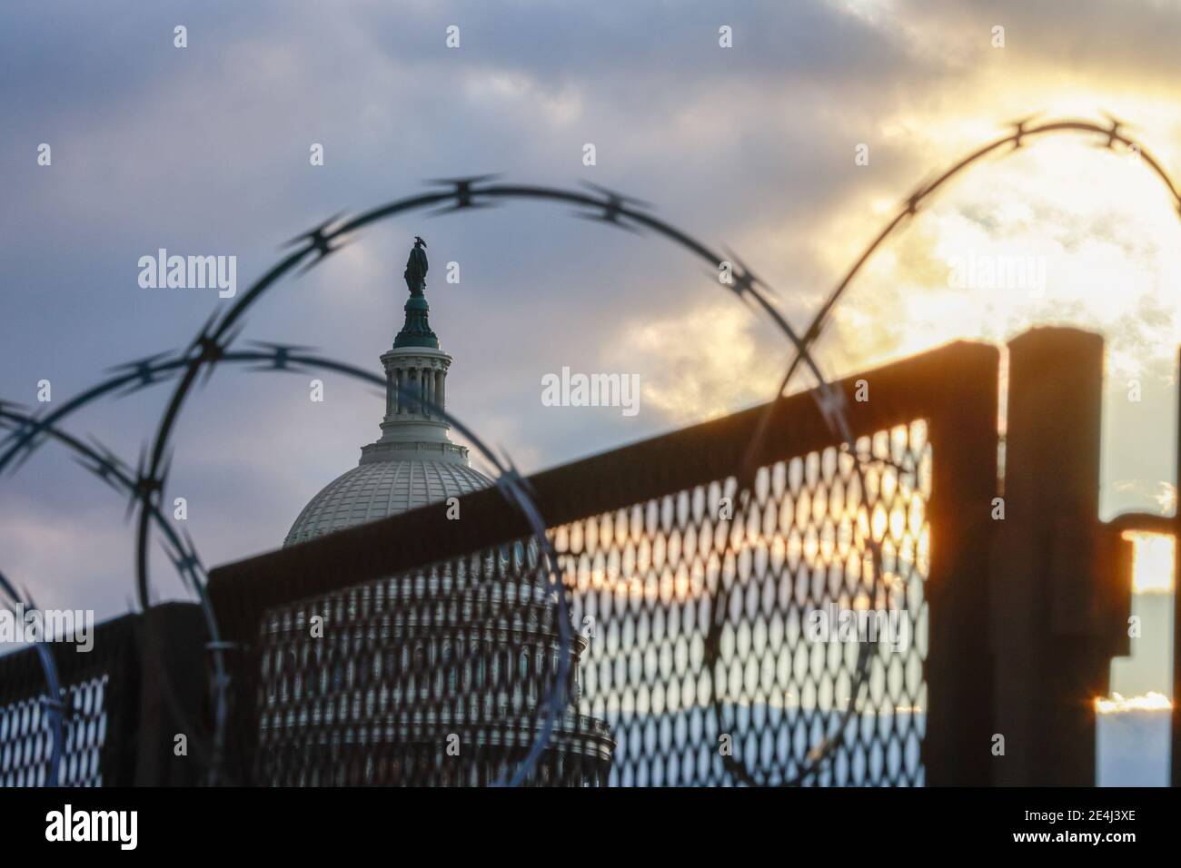 Razor wire and fences still surround the United States Capitol building ...