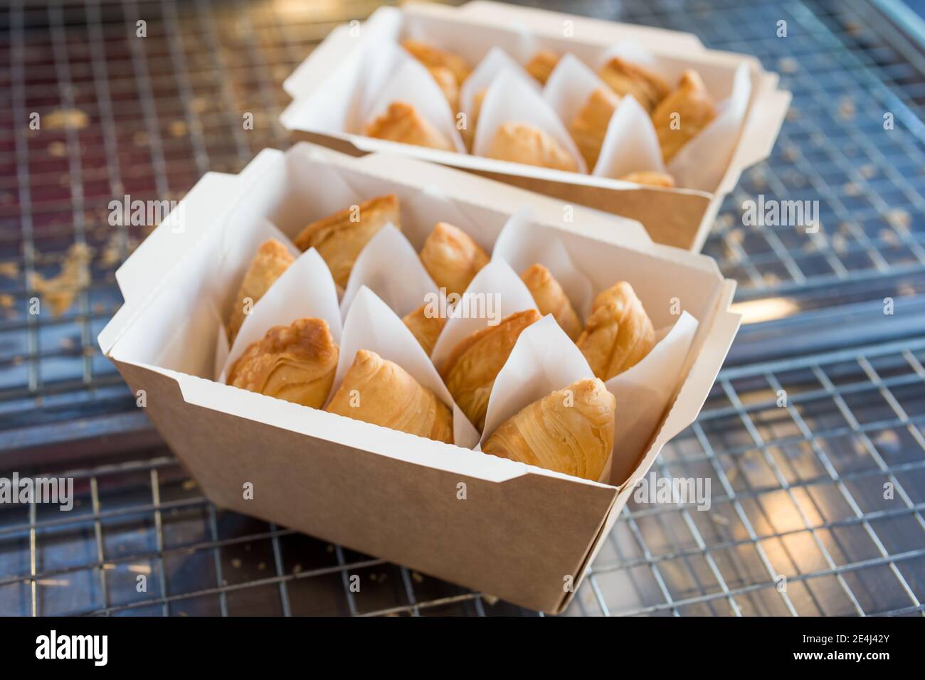 Set of curry puff in paper box Stock Photo - Alamy