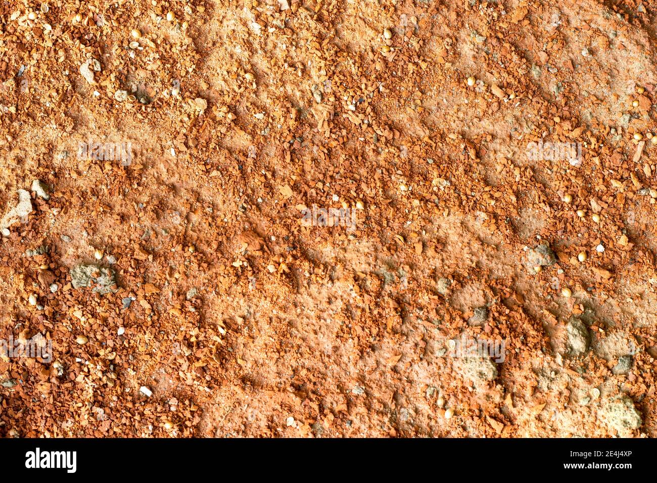 Red texture of mixing Brick particles with soil Stock Photo - Alamy