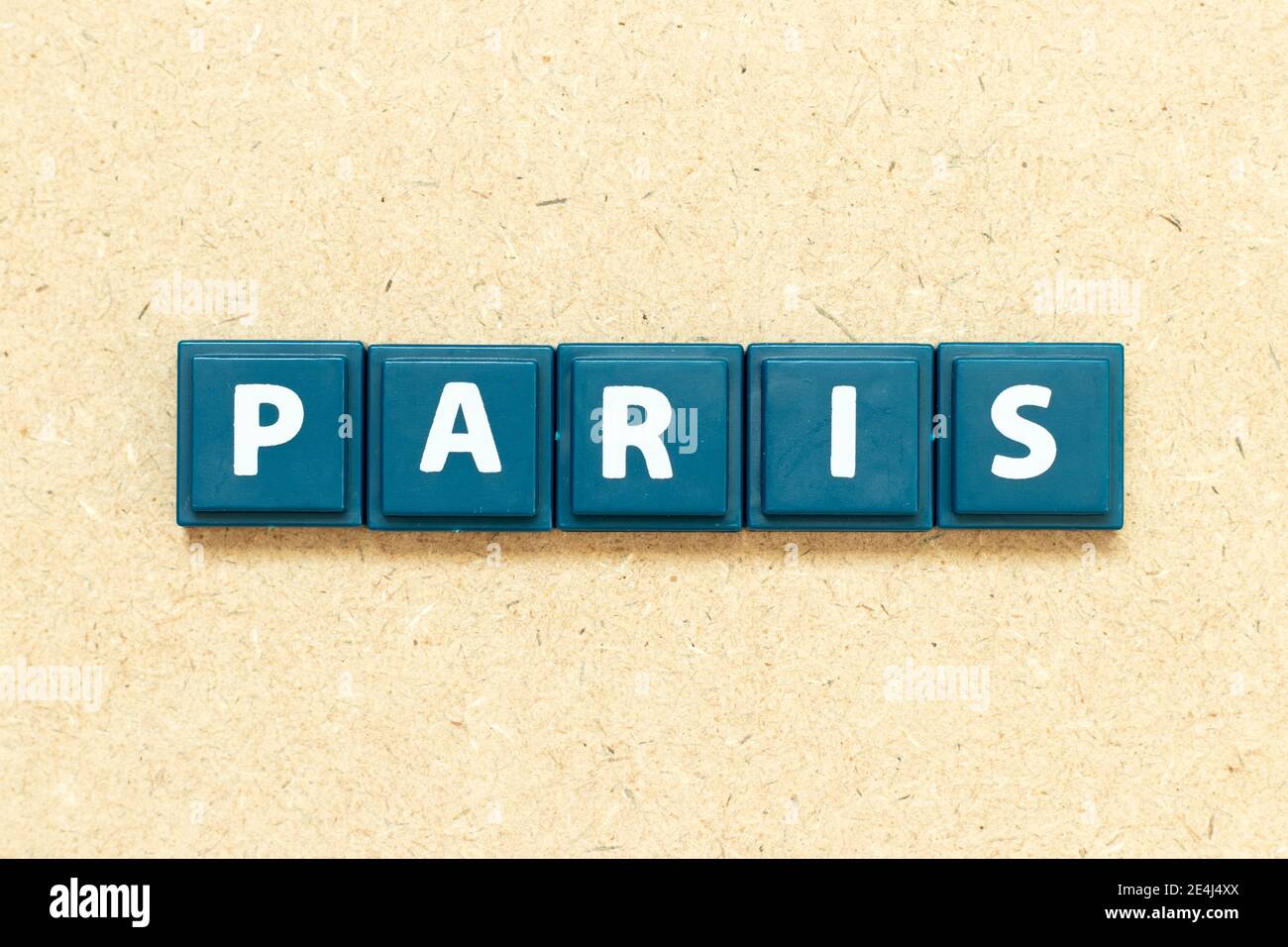 Tile alphabet letter in word paris on wood background Stock Photo - Alamy