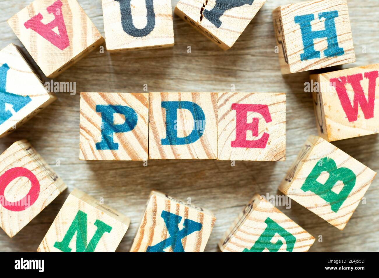 Alphabet letter block in word PDE (abbreviation of permitted daily ...