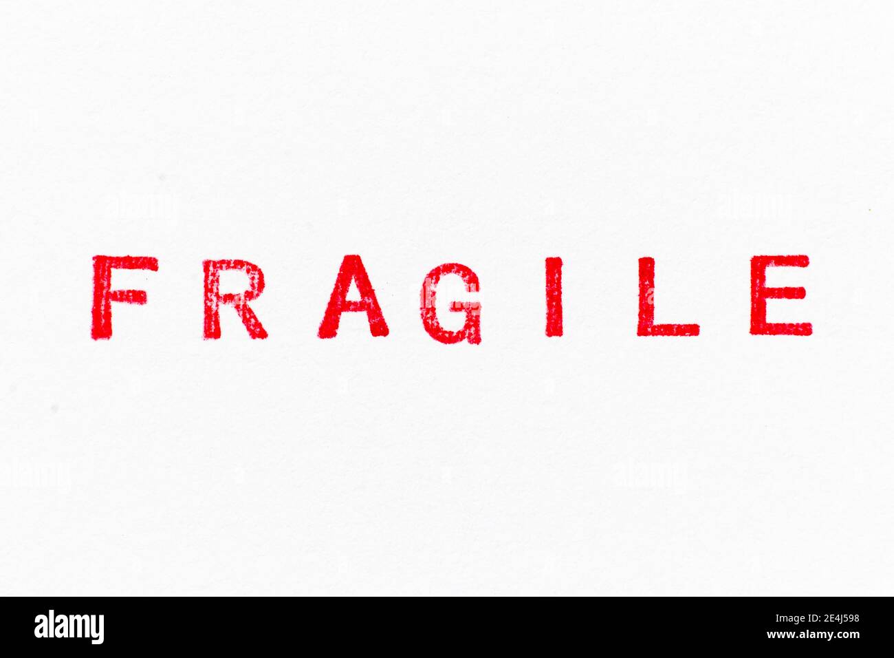 Red color fragile word ink rubber stamp on white paper background Stock ...