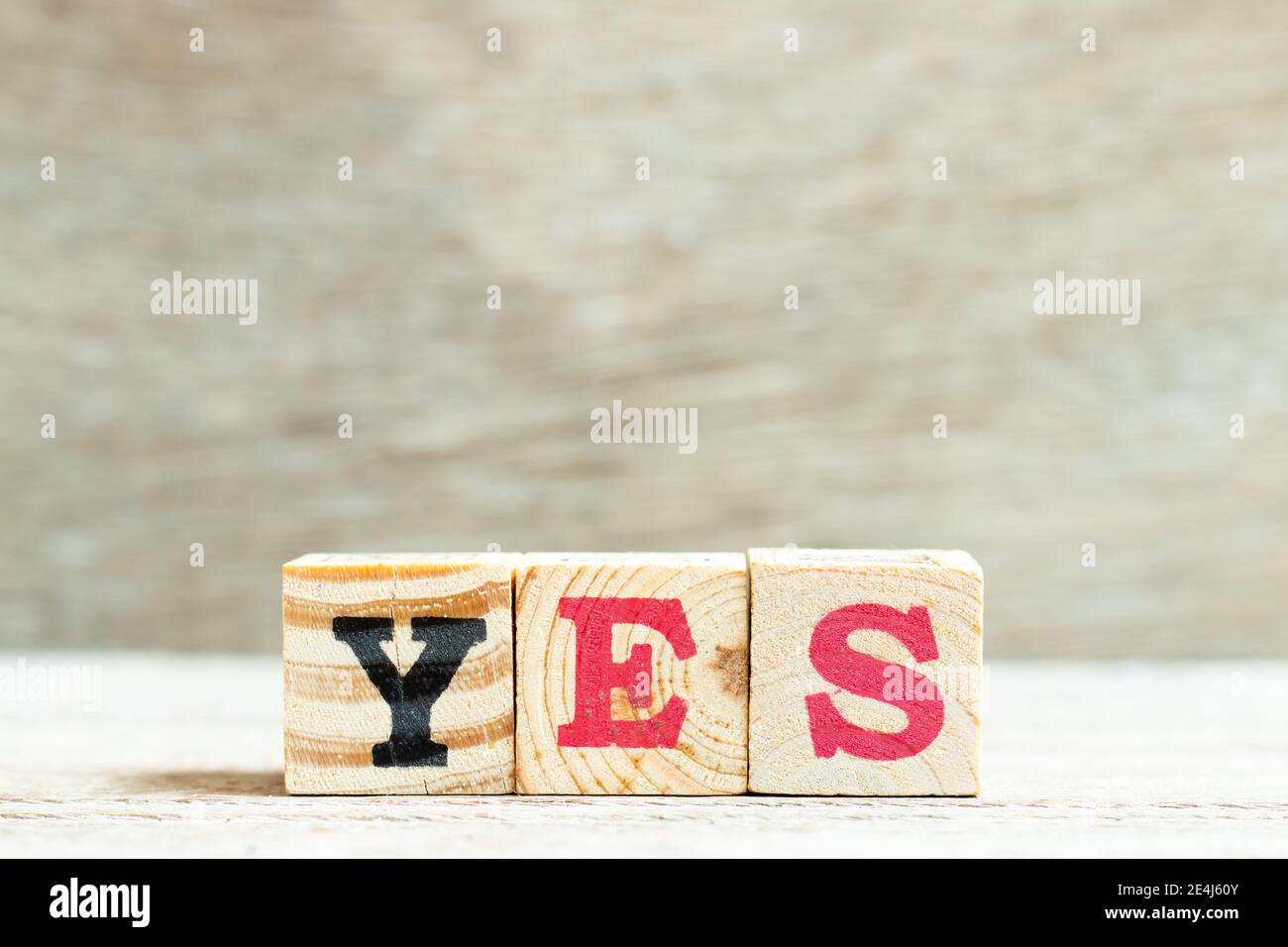 Alphabet letter in word yes on wood background Stock Photo - Alamy