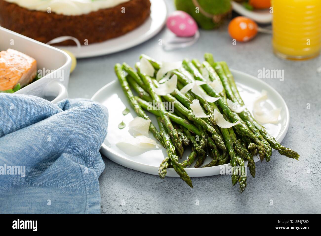 Roasted asparagus with parmesan for Easter Stock Photo - Alamy