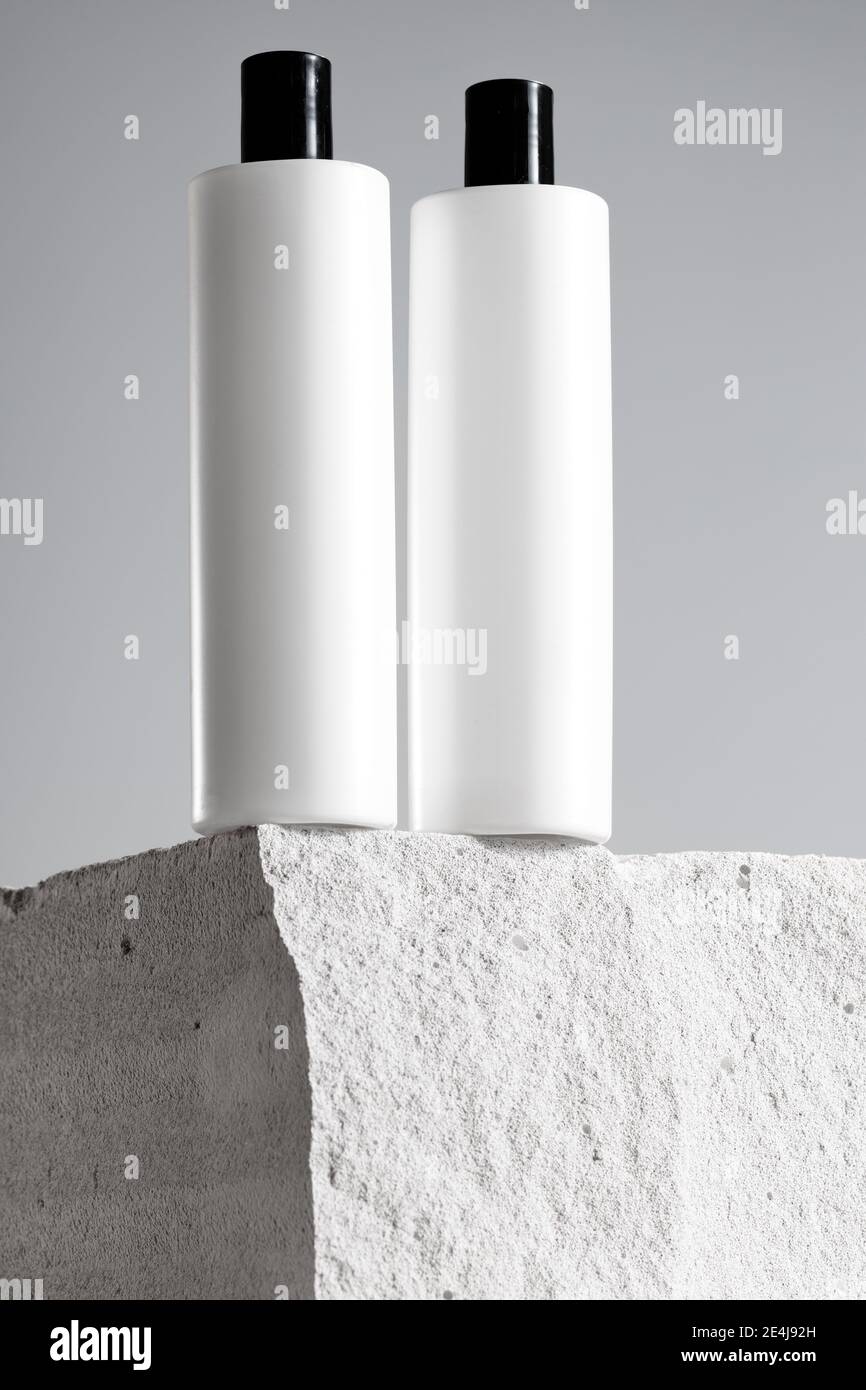 Cosmetic jar on gray cinder block close up Stock Photo - Alamy