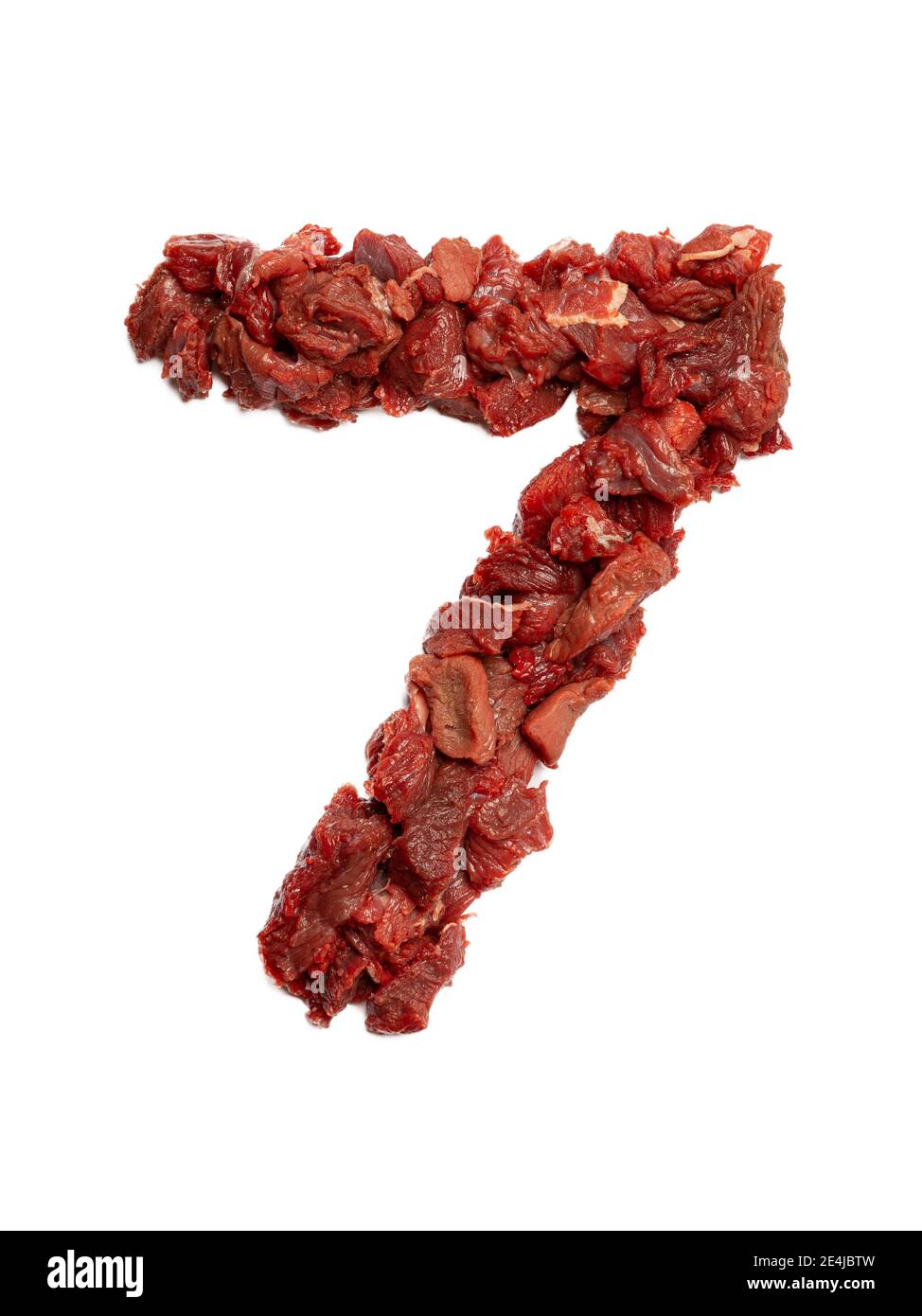 Arabic numeral "7" from cuts of beef on a white isolated background ...
