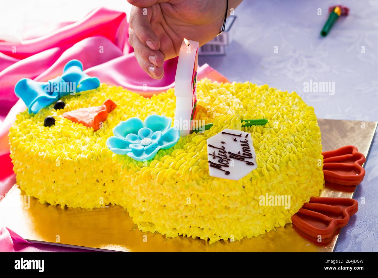 A closeup shot of a wonderful yellow cake made of a duck shape Stock ...