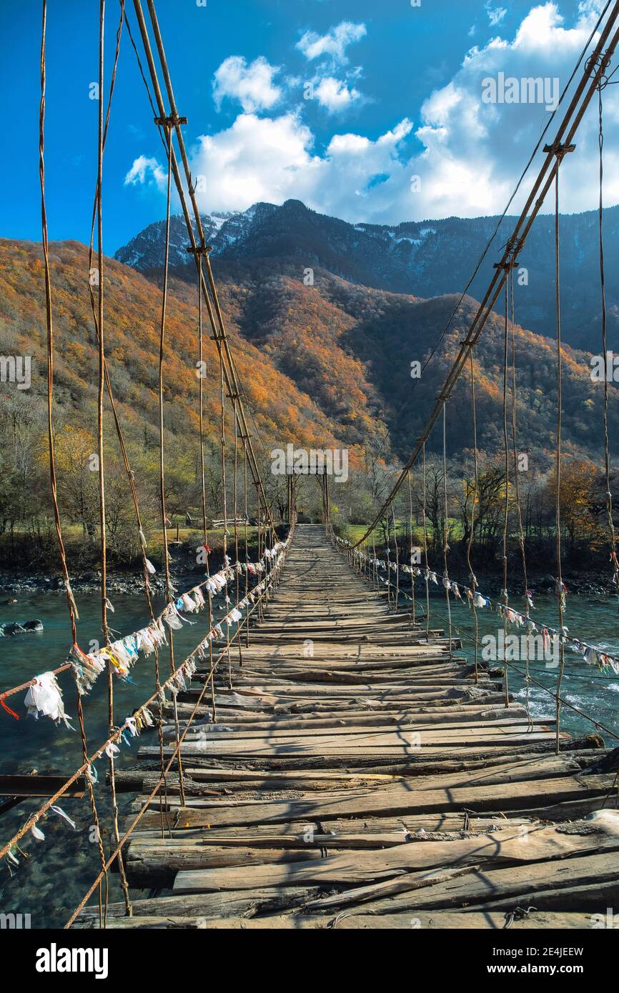 Old suspension bridge stretching over Lupshara River Stock Photo - Alamy