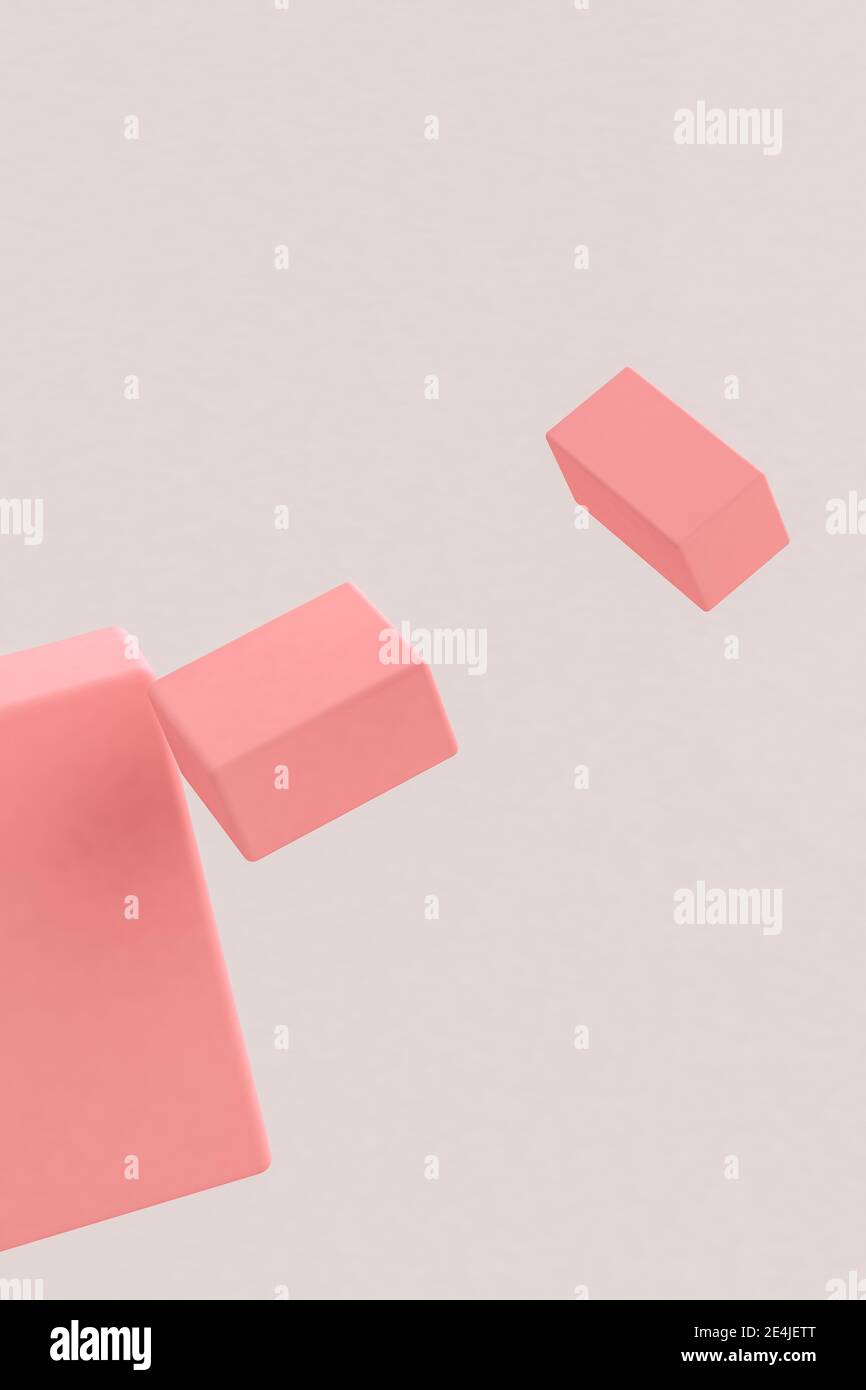 Three dimensional render of pink cuboids floating against gray ...