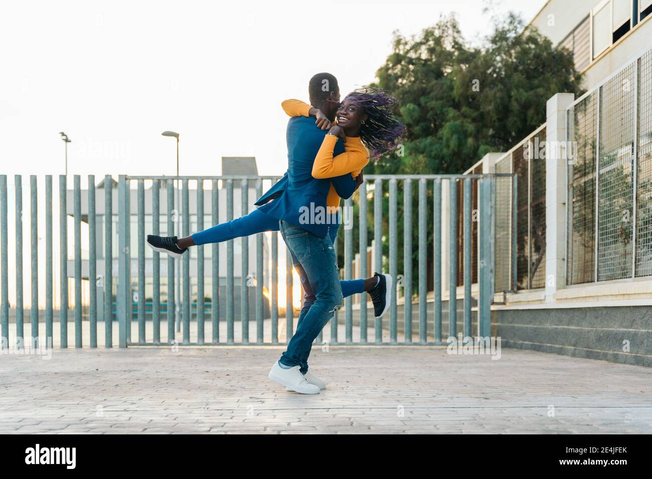 Lifting one arm hi-res stock photography and images - Alamy
