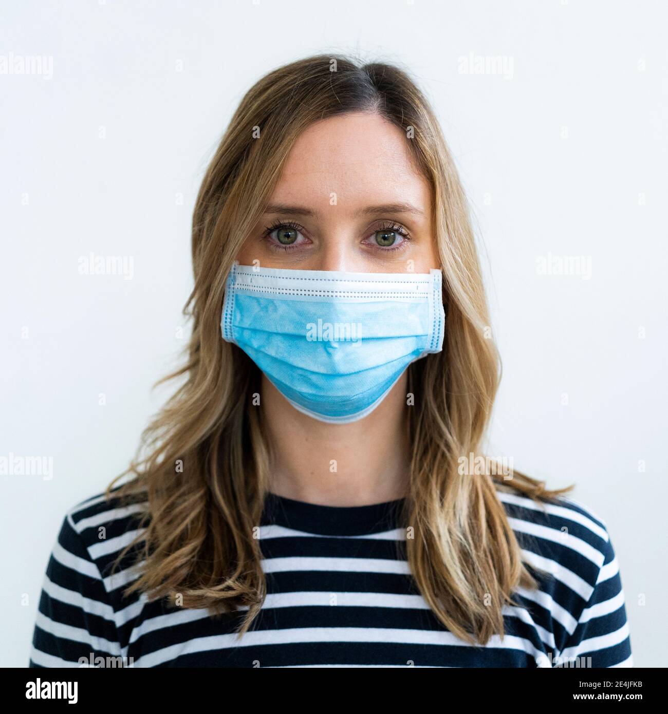Woman wearing hygiene mask hi-res stock photography and images - Alamy