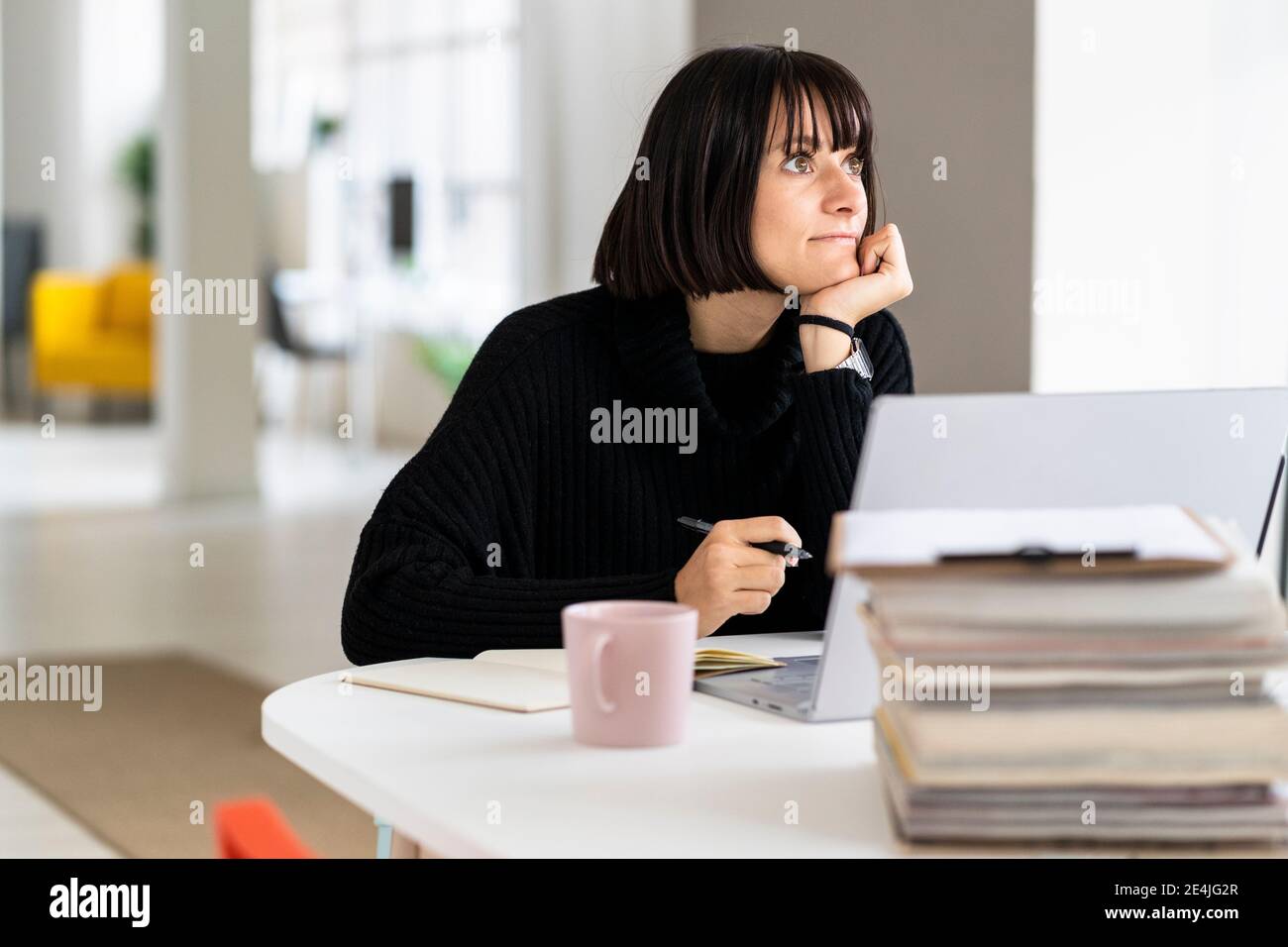 Female student hand up desk hi-res stock photography and images - Alamy