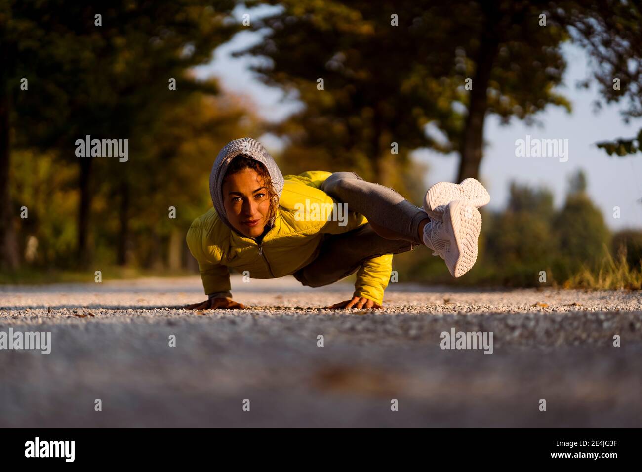 Portrait road woman stretching hi-res stock photography and images - Alamy